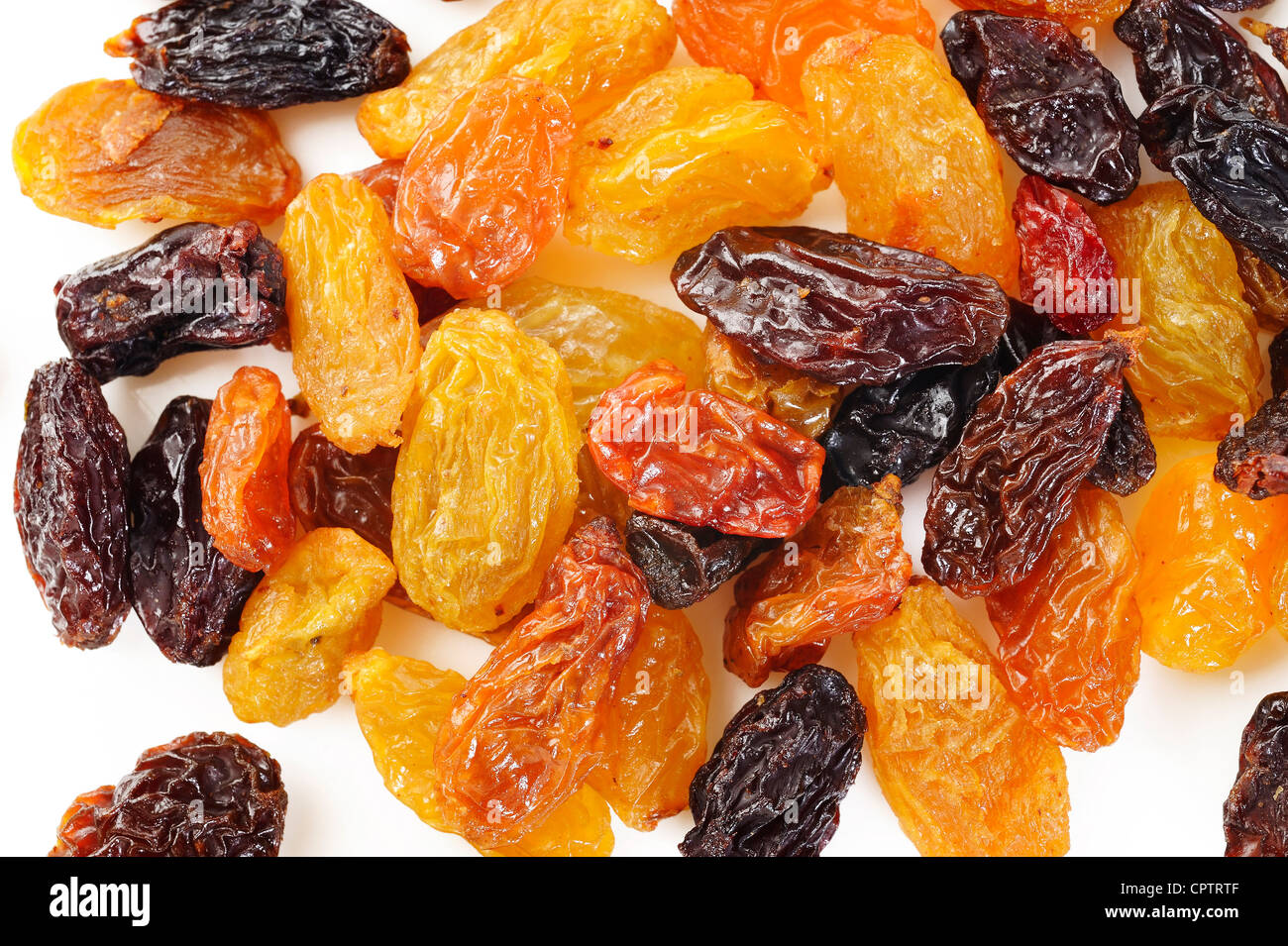 sweet dry raisin on background Stock Photo - Alamy