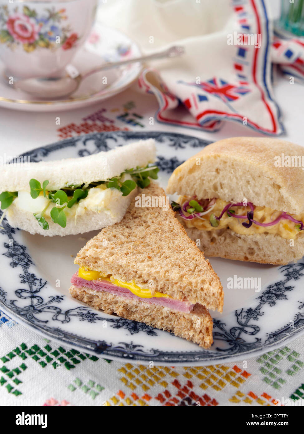 Egg mayo on white ham on wholemeal and coronation chicken in ciabatta ...