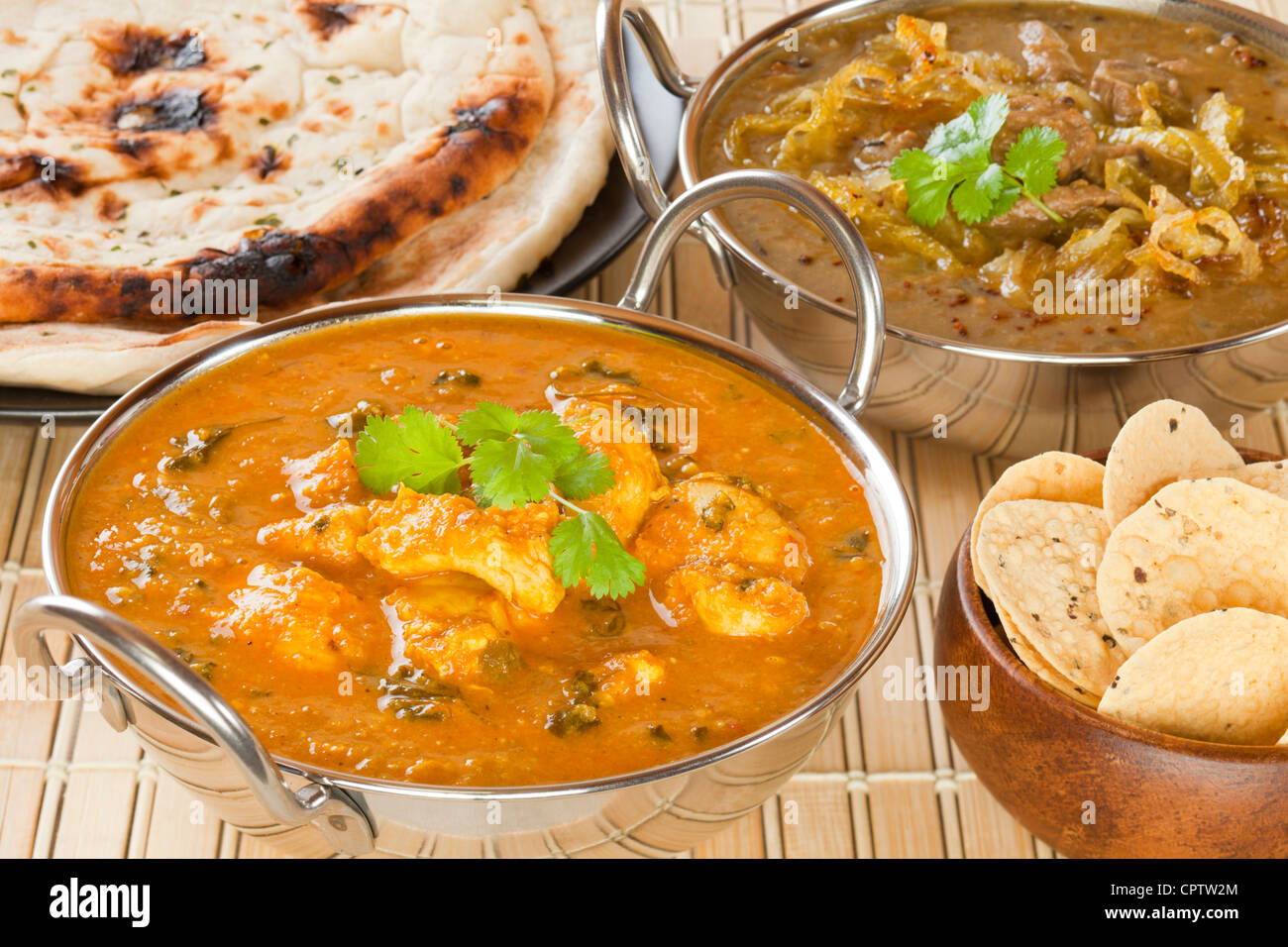 Methi Chicken, or Butter Chicken, with lamb dhansak, naan bread and ...