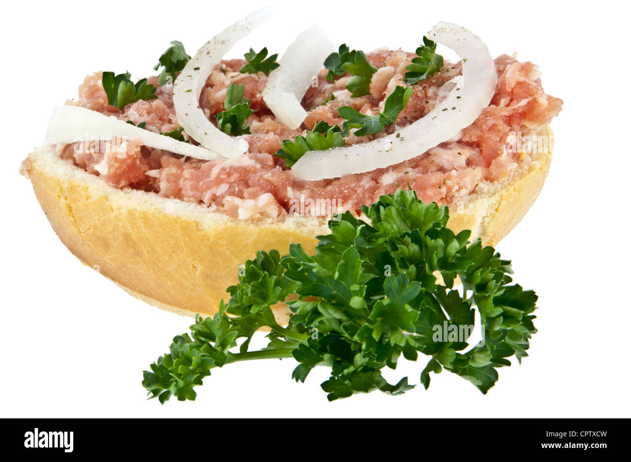 Halved roll with minced pork (In German called Mettbrötchen) isolated ...