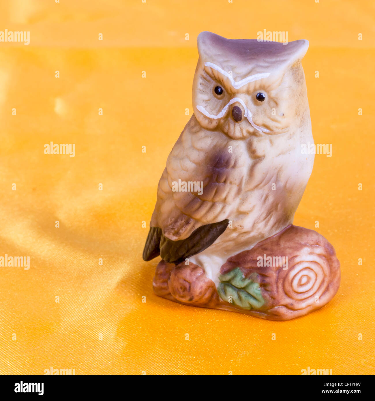 Porcelain figurine, owl on branch Stock Photo - Alamy