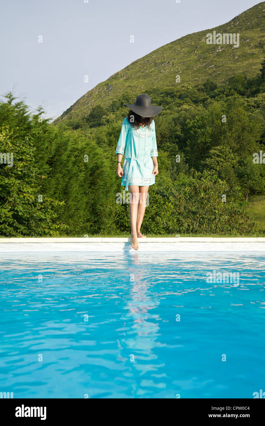 woman barefoot at swimming pool border in Asturias Spain Stock Photo ...