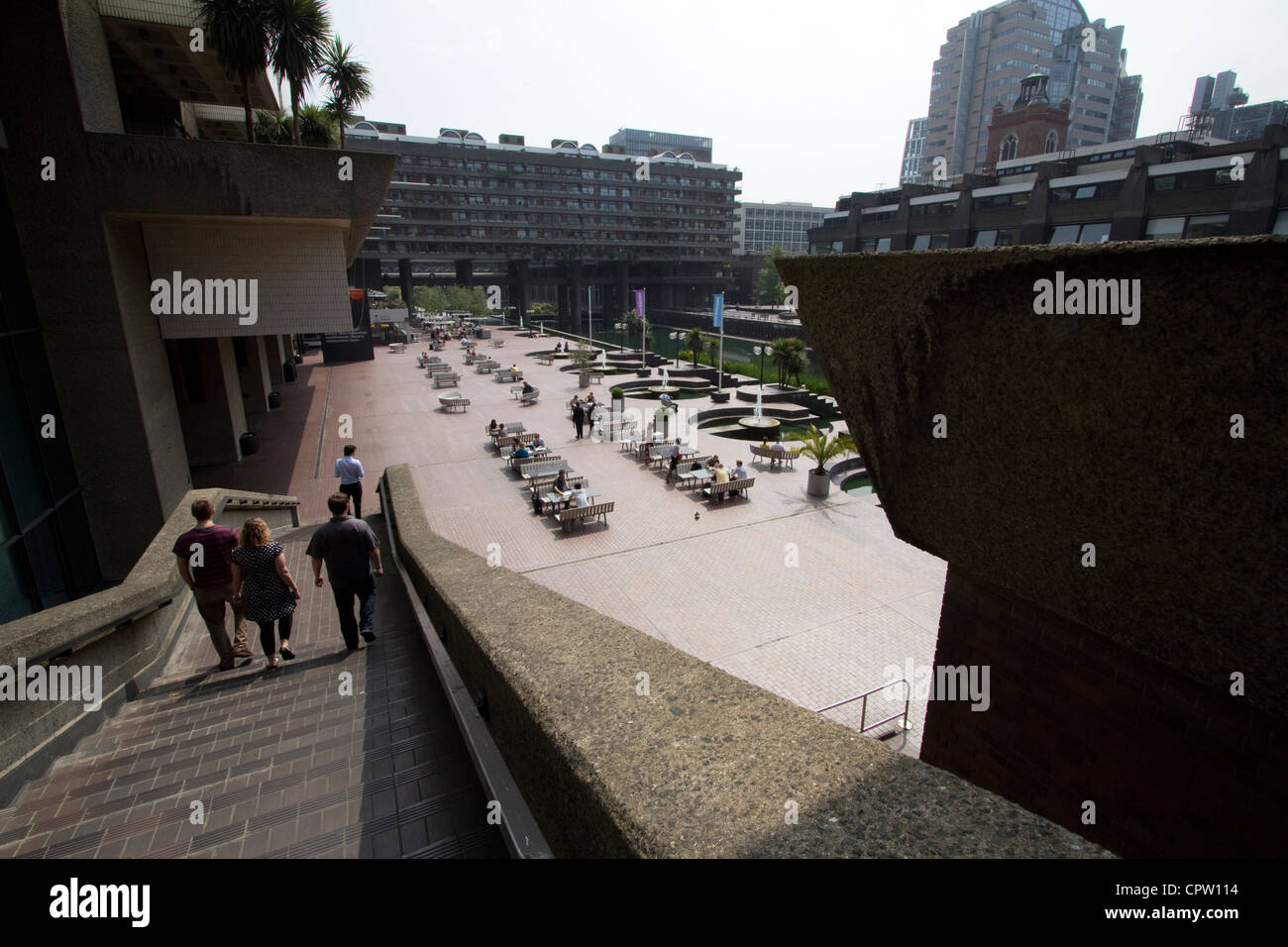 barbican centre London stairs leading to central eating area and lake ...