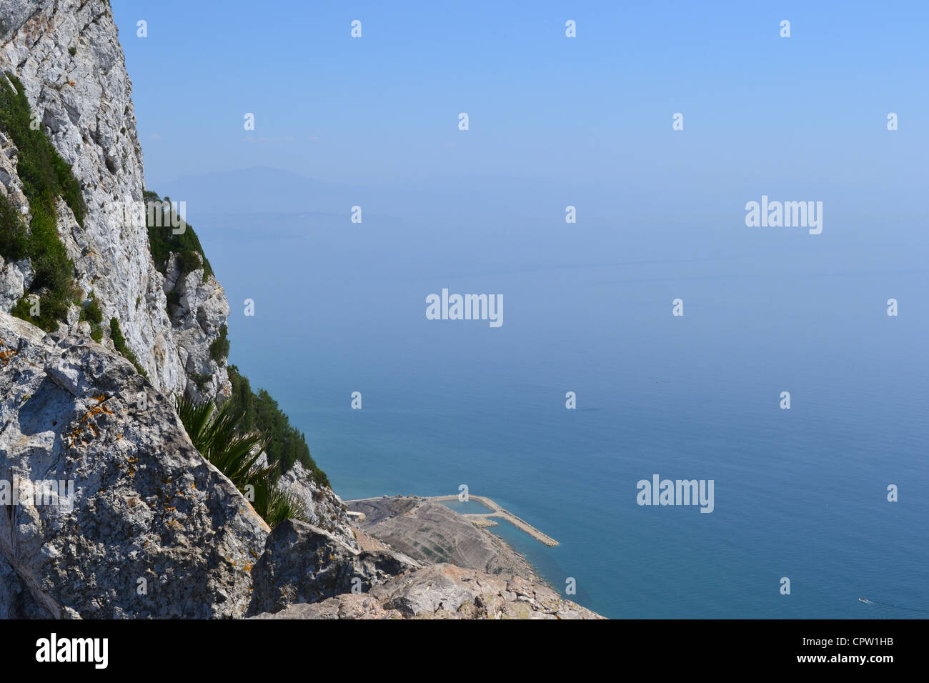 View of the Ocean and Cliff in Gibraltar Small Beach at the bottom of ...