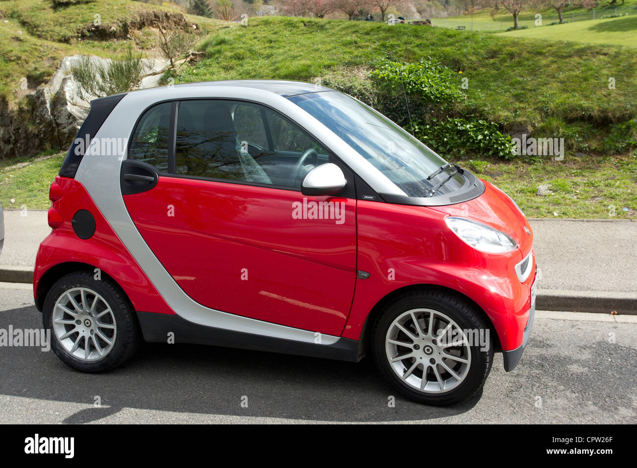 Electric red smart car Stock Photo - Alamy