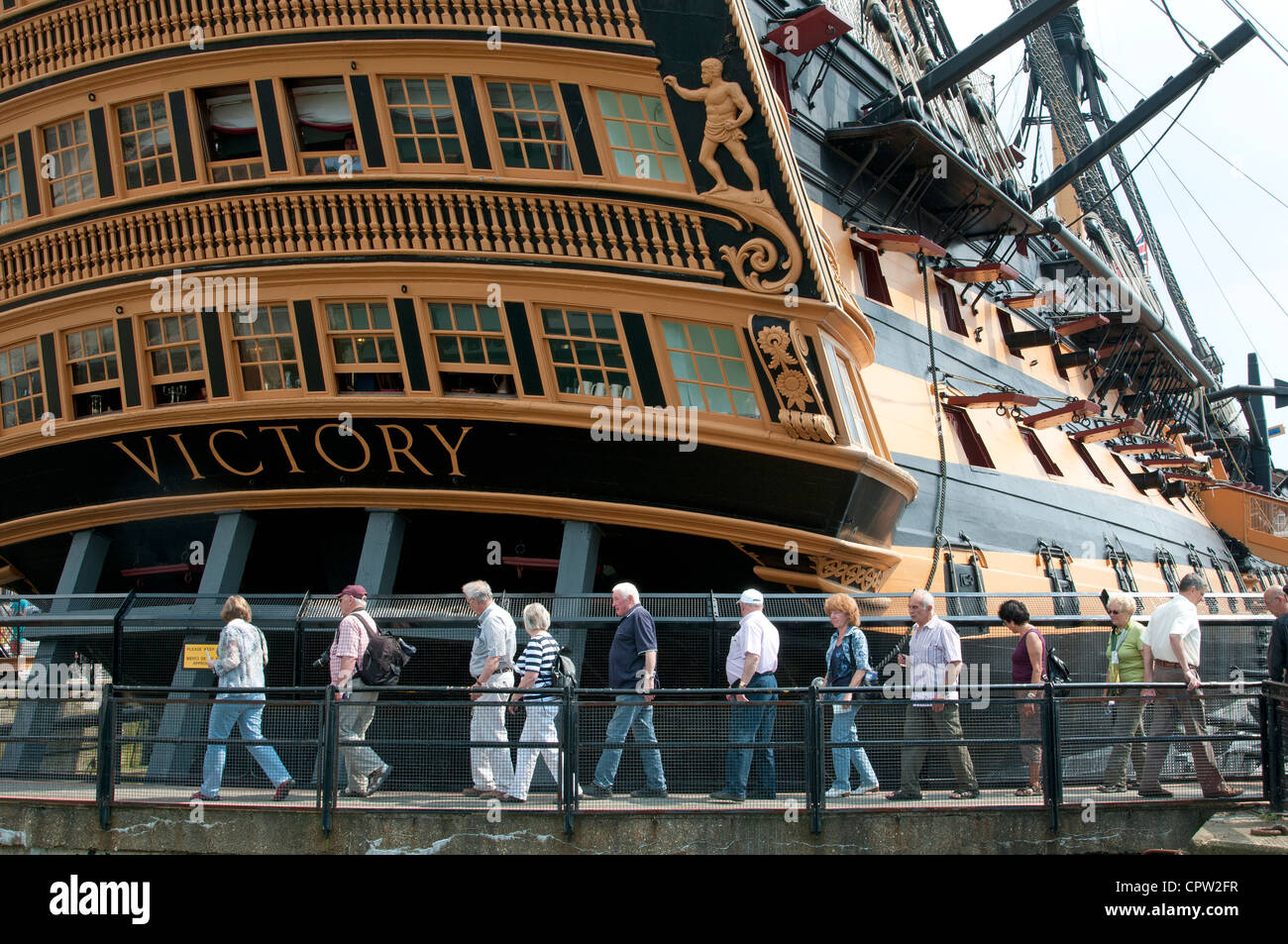 Visitors viewing HMS Victory in Portsmouth Historic Dockyard UK Stock ...