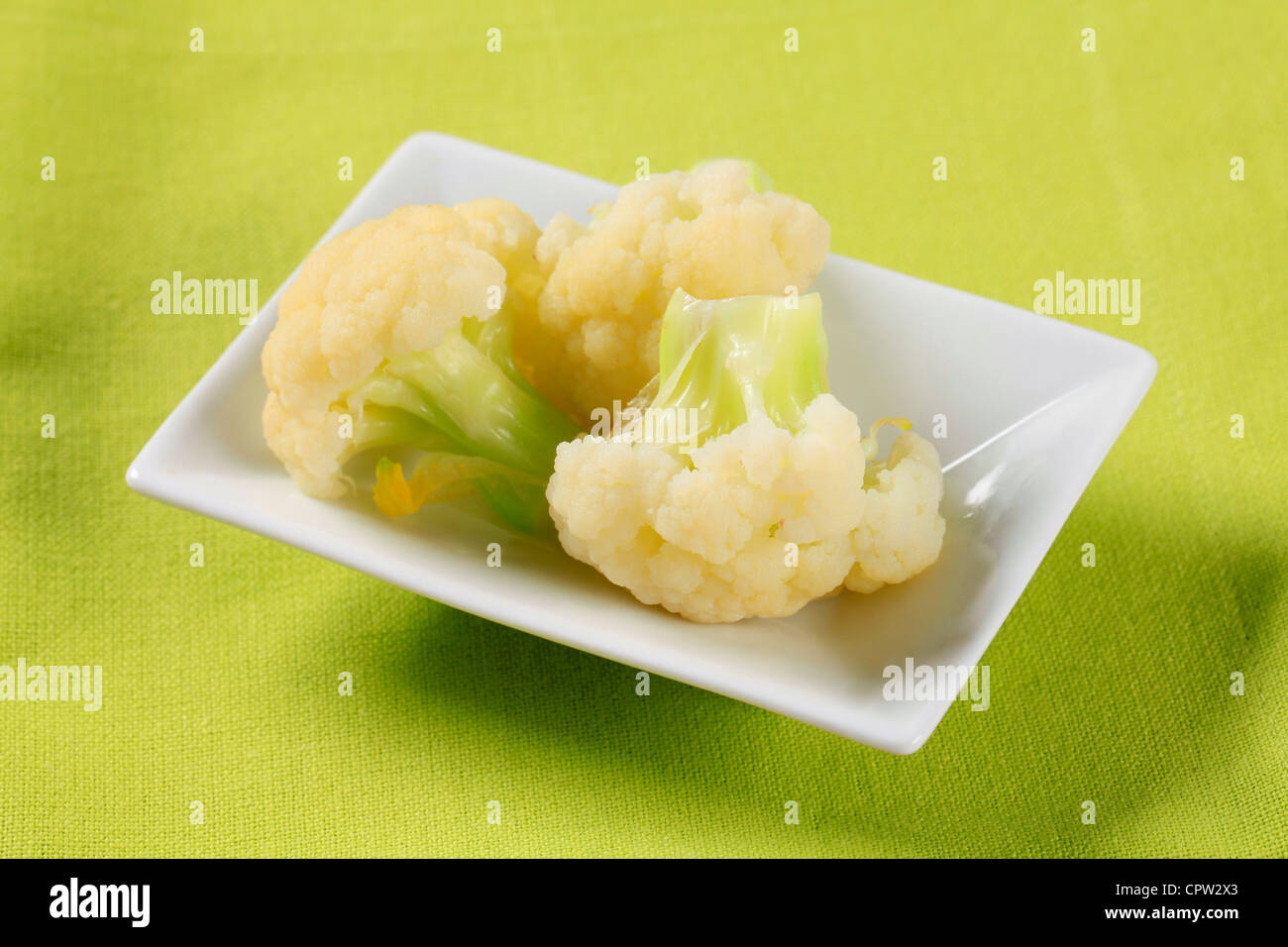 Pieces of cooked cauliflower Stock Photo - Alamy