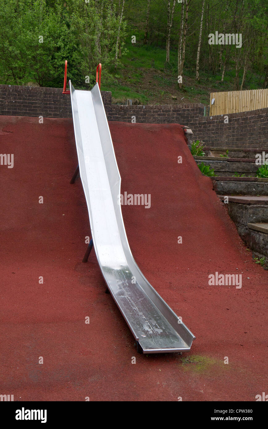Children's play area slide Stock Photo - Alamy