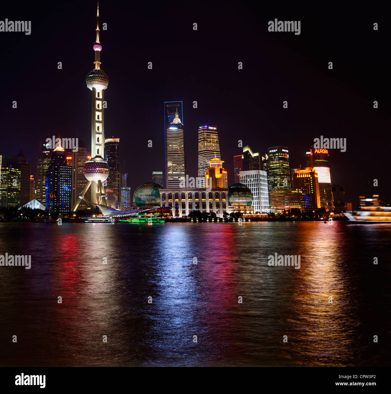 High rise building building with bright lights hi-res stock photography ...