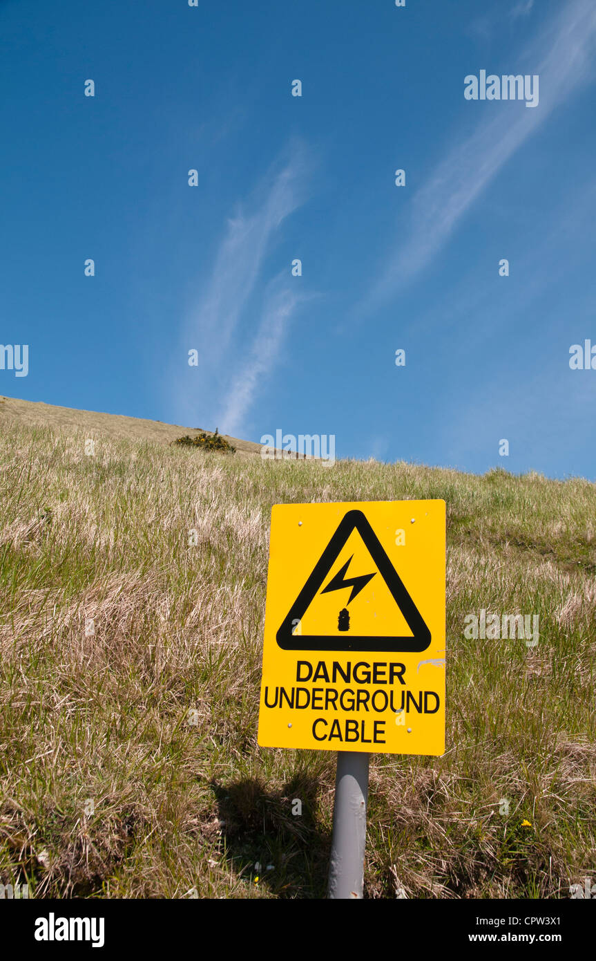 Underground cable warning sign hi-res stock photography and images - Alamy