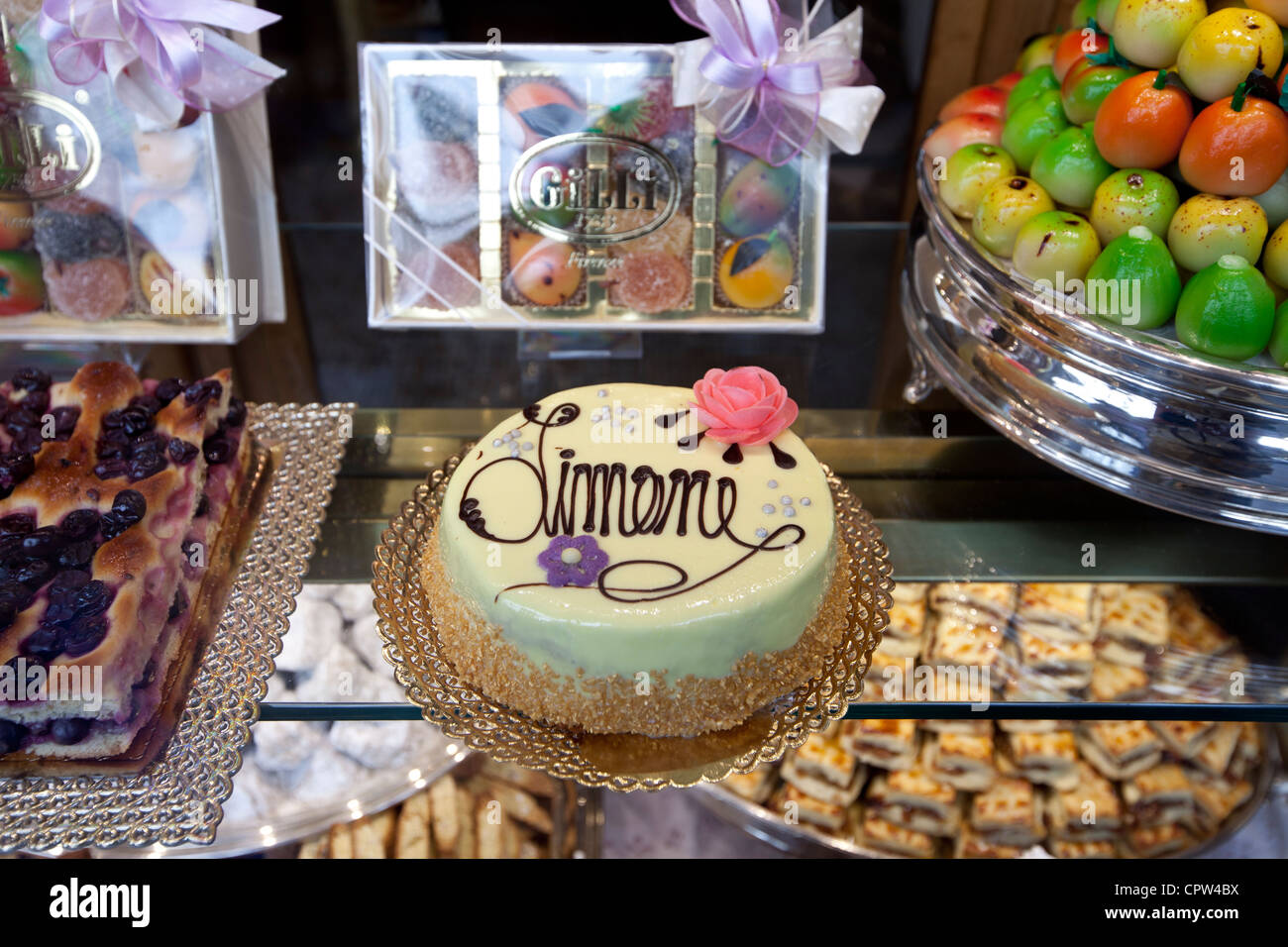 Cakes, sweets and pastries in shop window of luxury patticeria, caffe ...