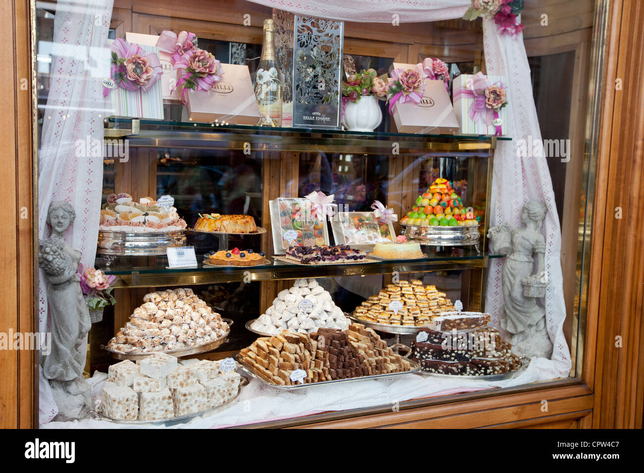 Cakes, sweets and pastries in shop window of luxury patticeria, caffe sweet shop Gilli, in ...