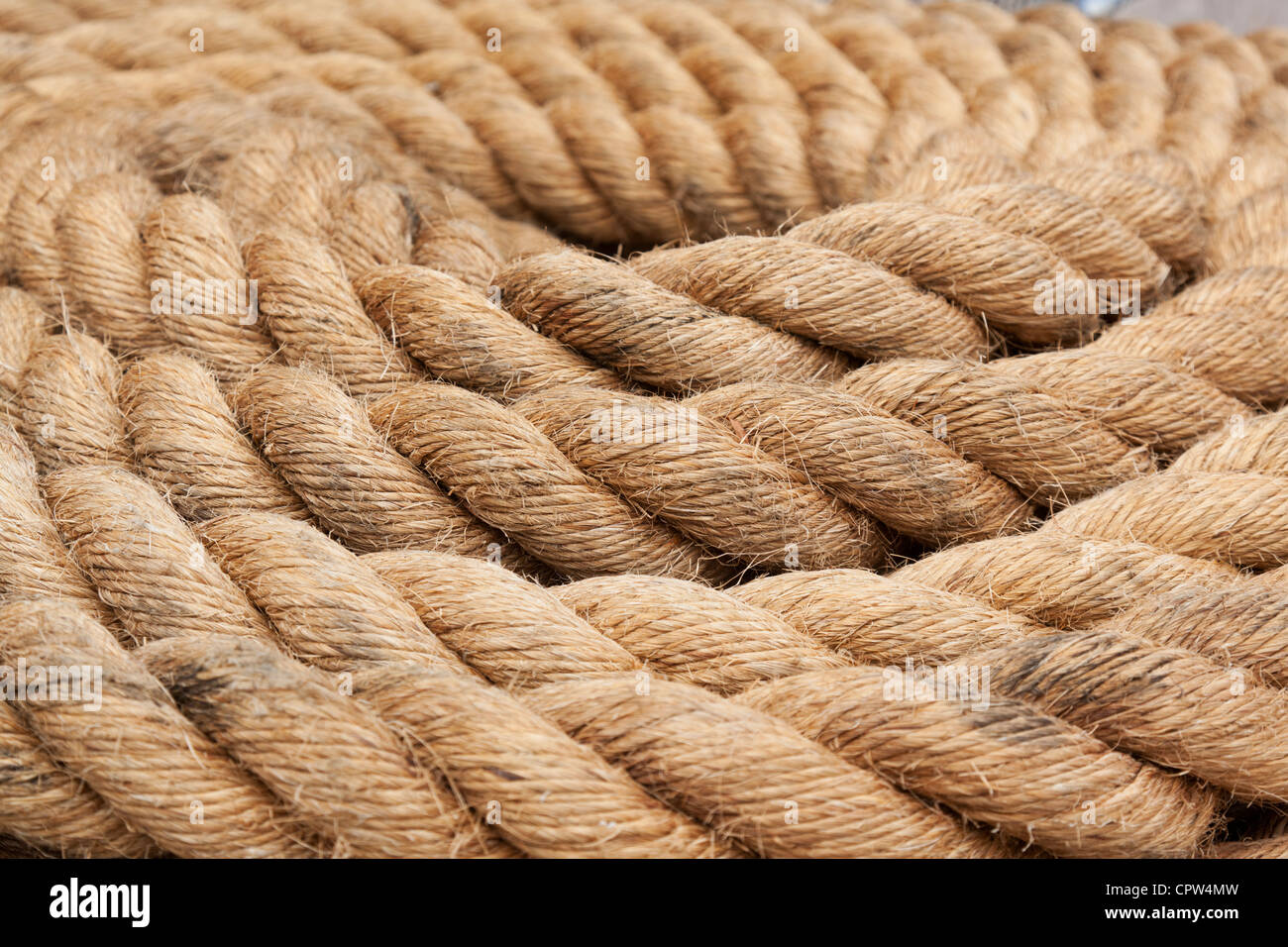 Coils of old manila rope Stock Photo - Alamy