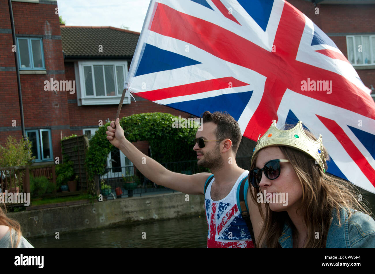Queen's Jubillegal flotilla floating party, Regent's Canal. Young man ...