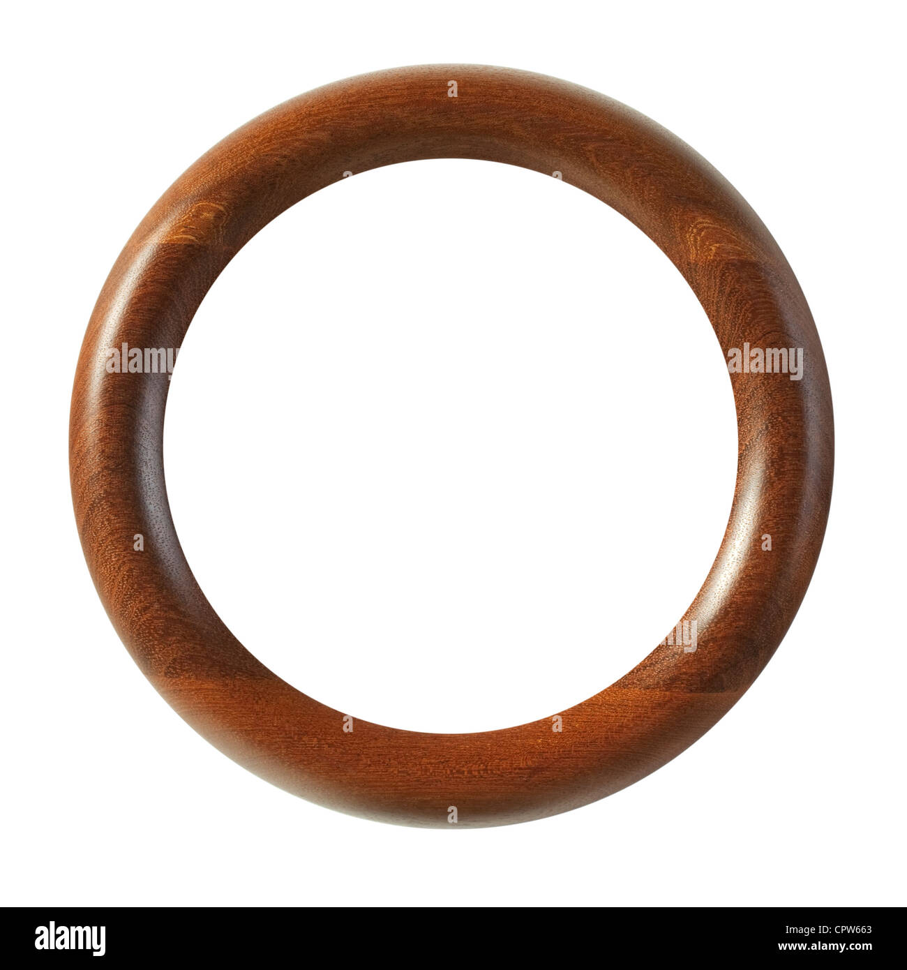 Small round turned wooden frame isolated on white. This frame is a ...