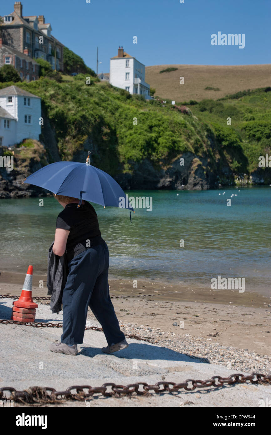 Harbour lady umbrella hi-res stock photography and images - Alamy