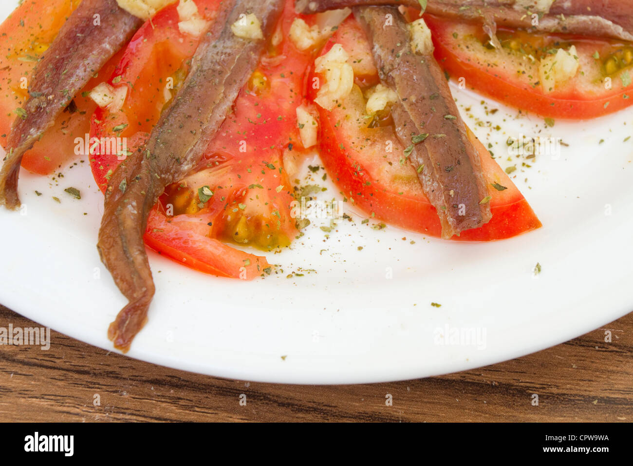 Anchovy and tomato salad Stock Photo - Alamy