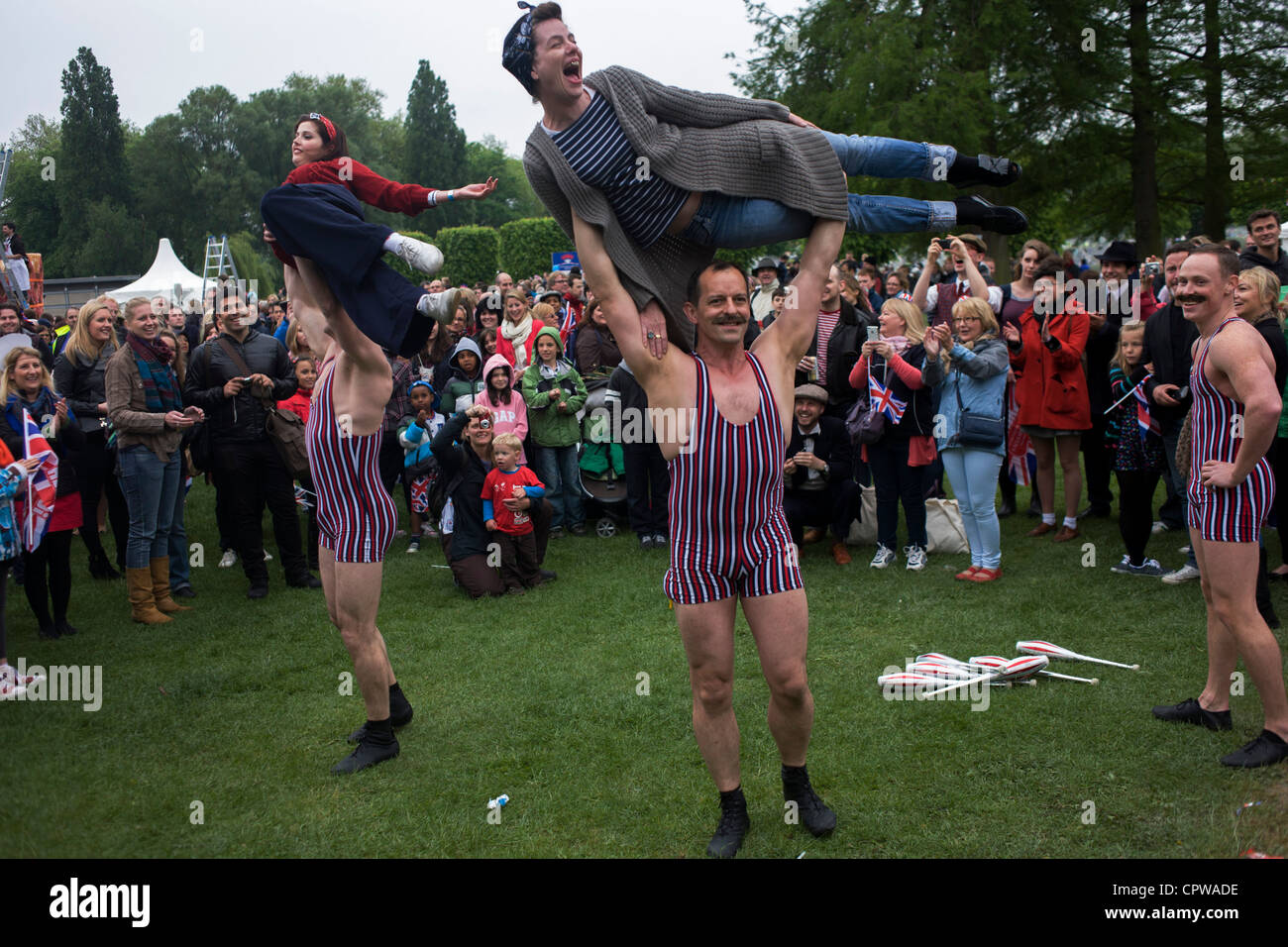 Strong men perform strength acts as the great British public brave bad ...
