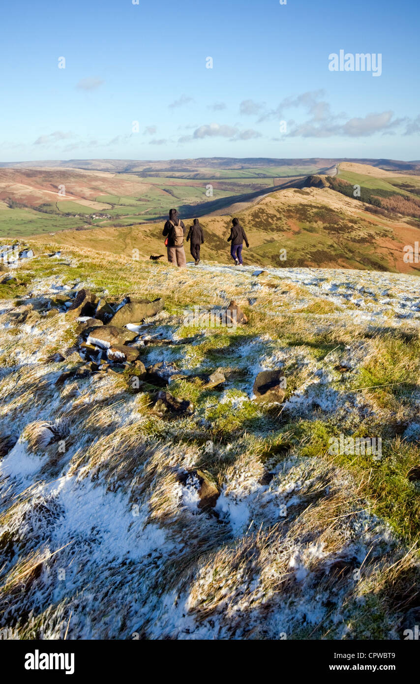 Hikers walking on Mam Tor in the Peak District National Park ...