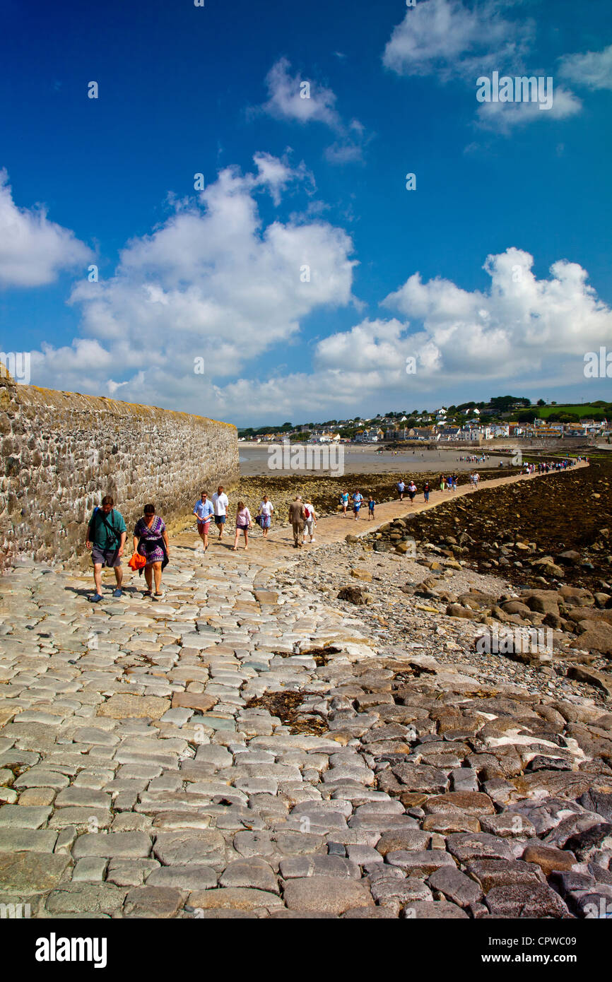 Stone tidal causeway leading st hi-res stock photography and images - Alamy