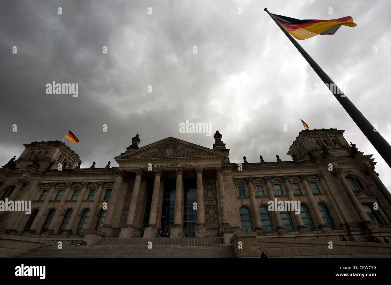 Flag of germany on reichstag building hi-res stock photography and ...