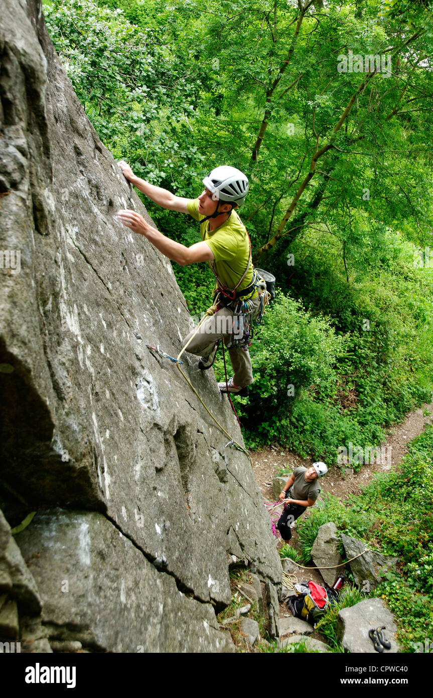 A rock climber leading a climb Stock Photo - Alamy