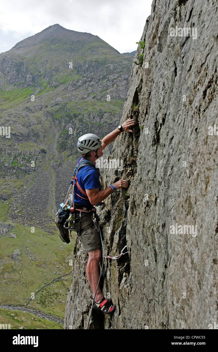A climber leading Spiral Stairs on Dinas Cromlech Stock Photo - Alamy