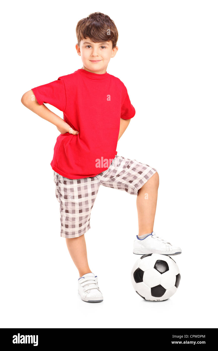 Full length portrait of a boy posing with a soccer ball isolated on ...