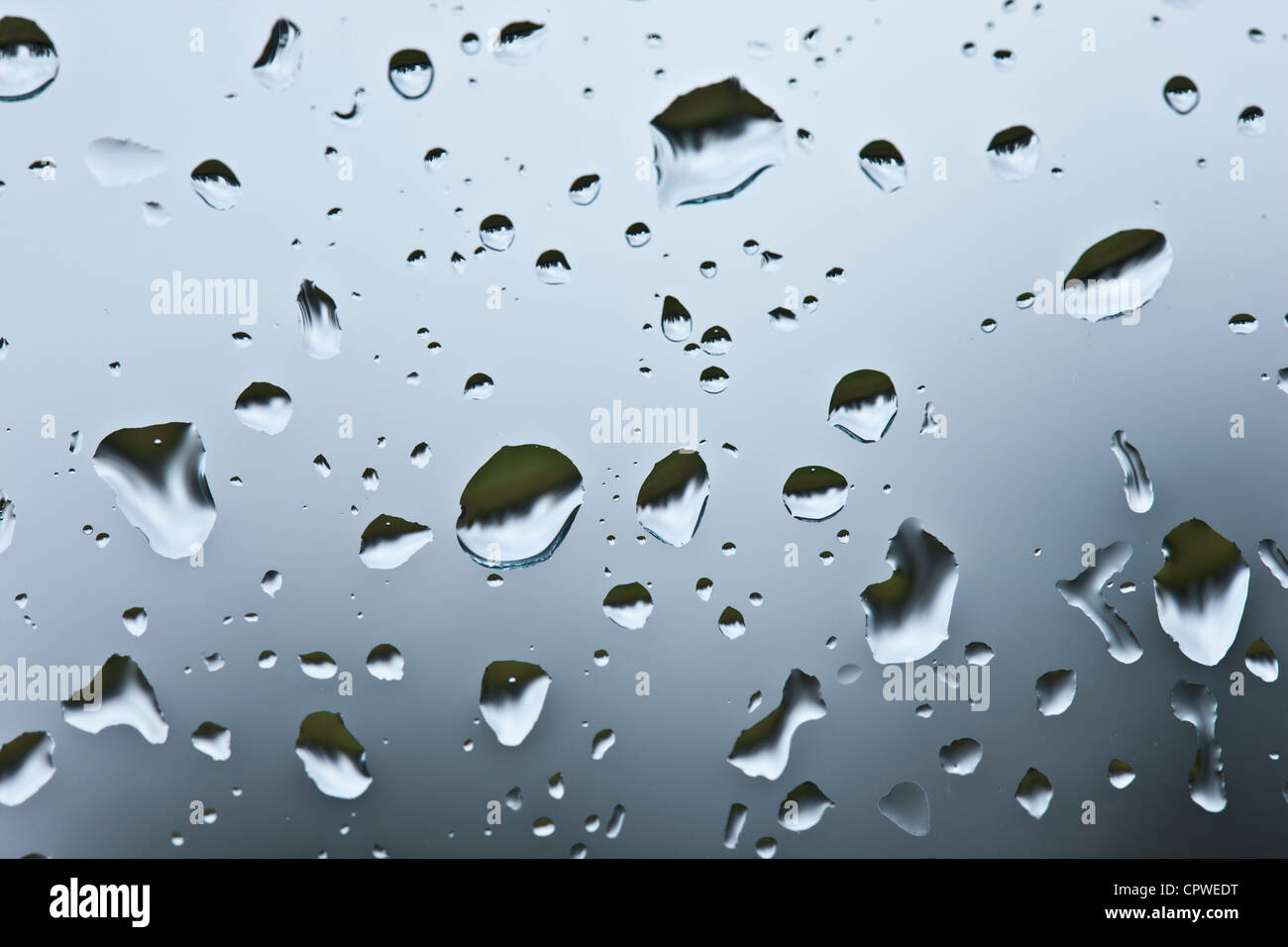Raindrops on glass Stock Photo - Alamy