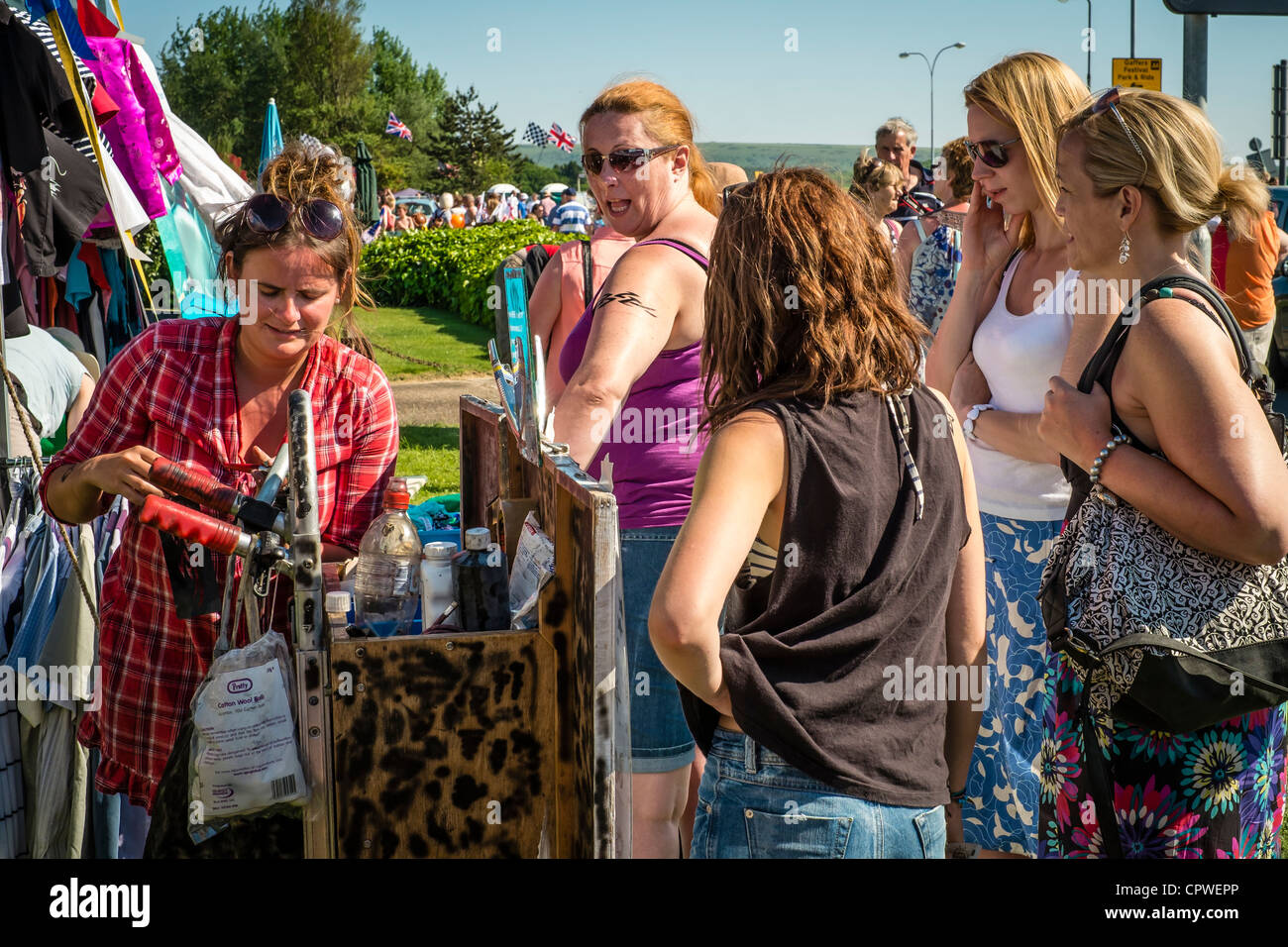 Tattoo stall hi-res stock photography and images - Alamy
