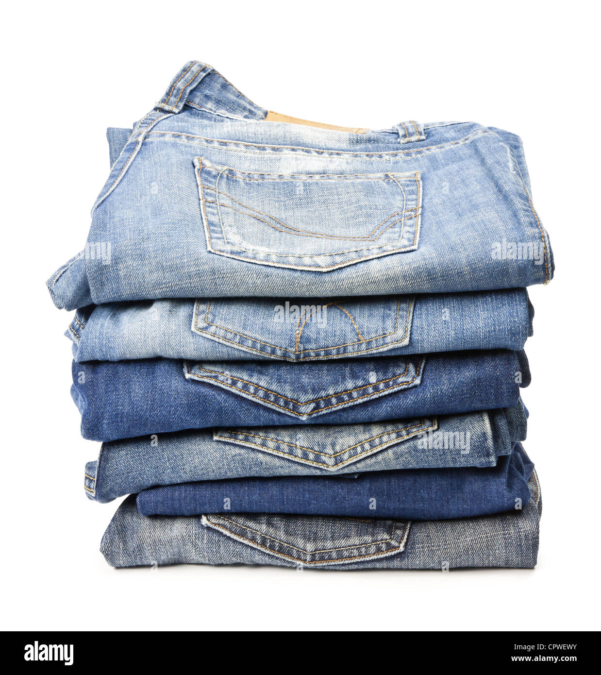 Jeans trousers stack on white background Stock Photo - Alamy