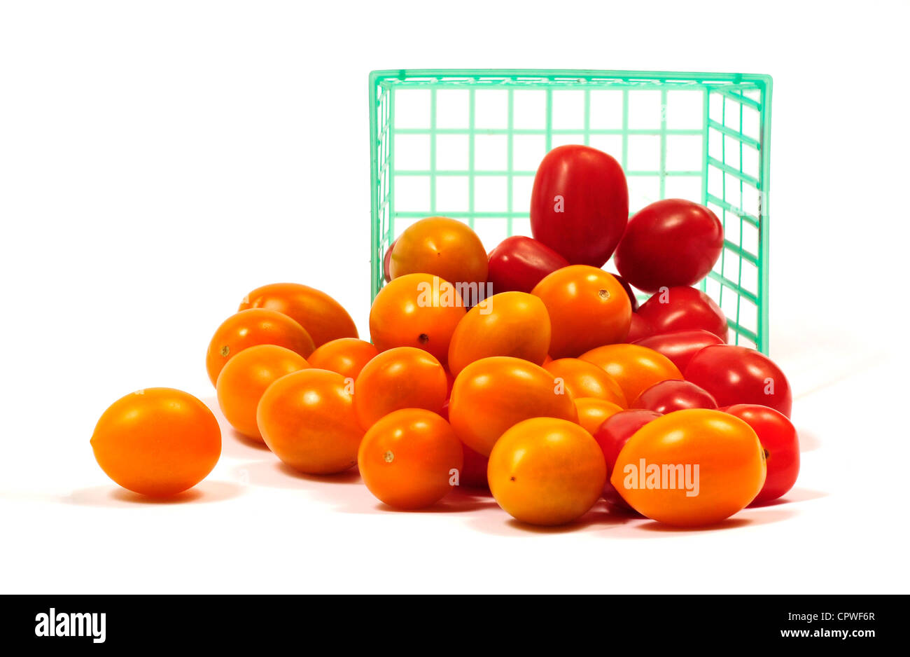 Organic red and yellow Roma tomatoes Stock Photo - Alamy