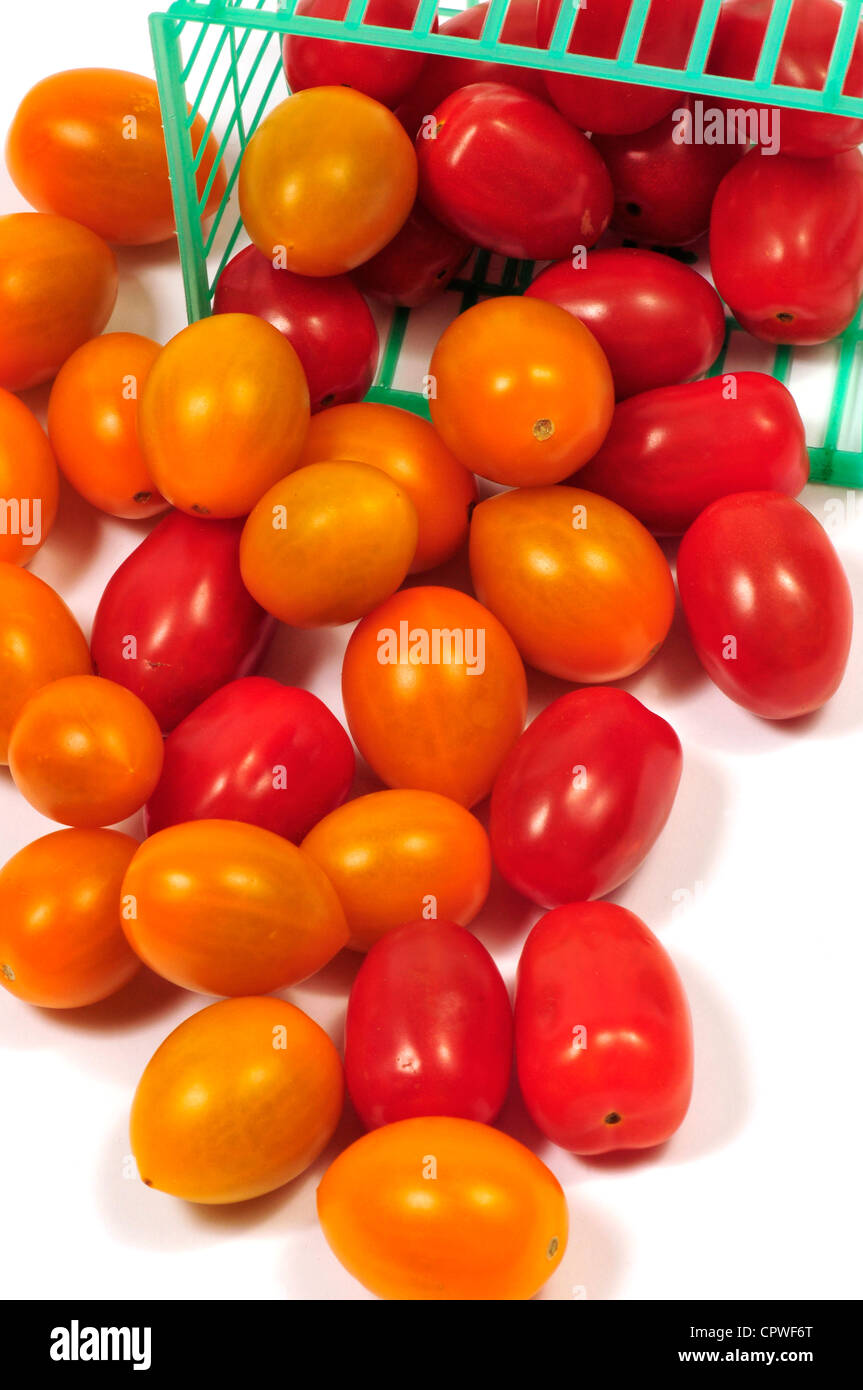 Organic red and yellow Roma tomatoes Stock Photo - Alamy