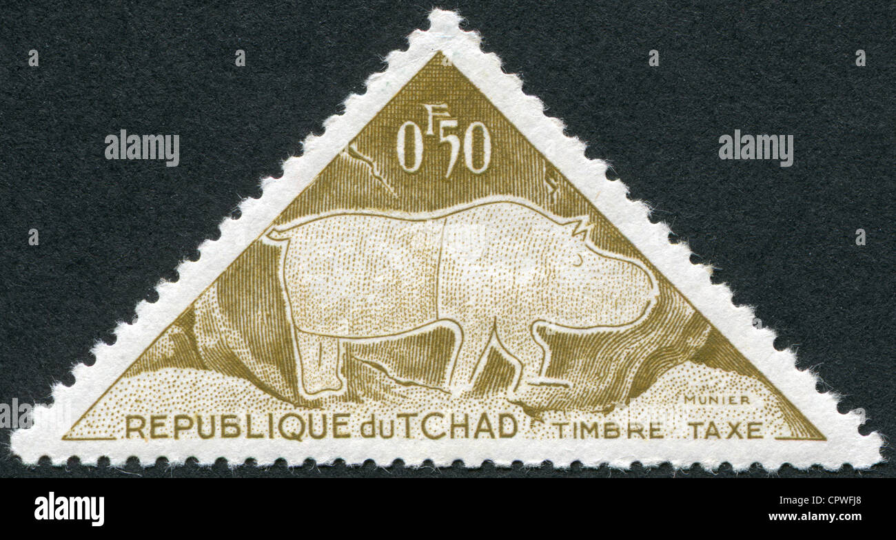 CHAD - CIRCA 1962: Postage stamps printed in Chad, shows a Rhinoceros ...