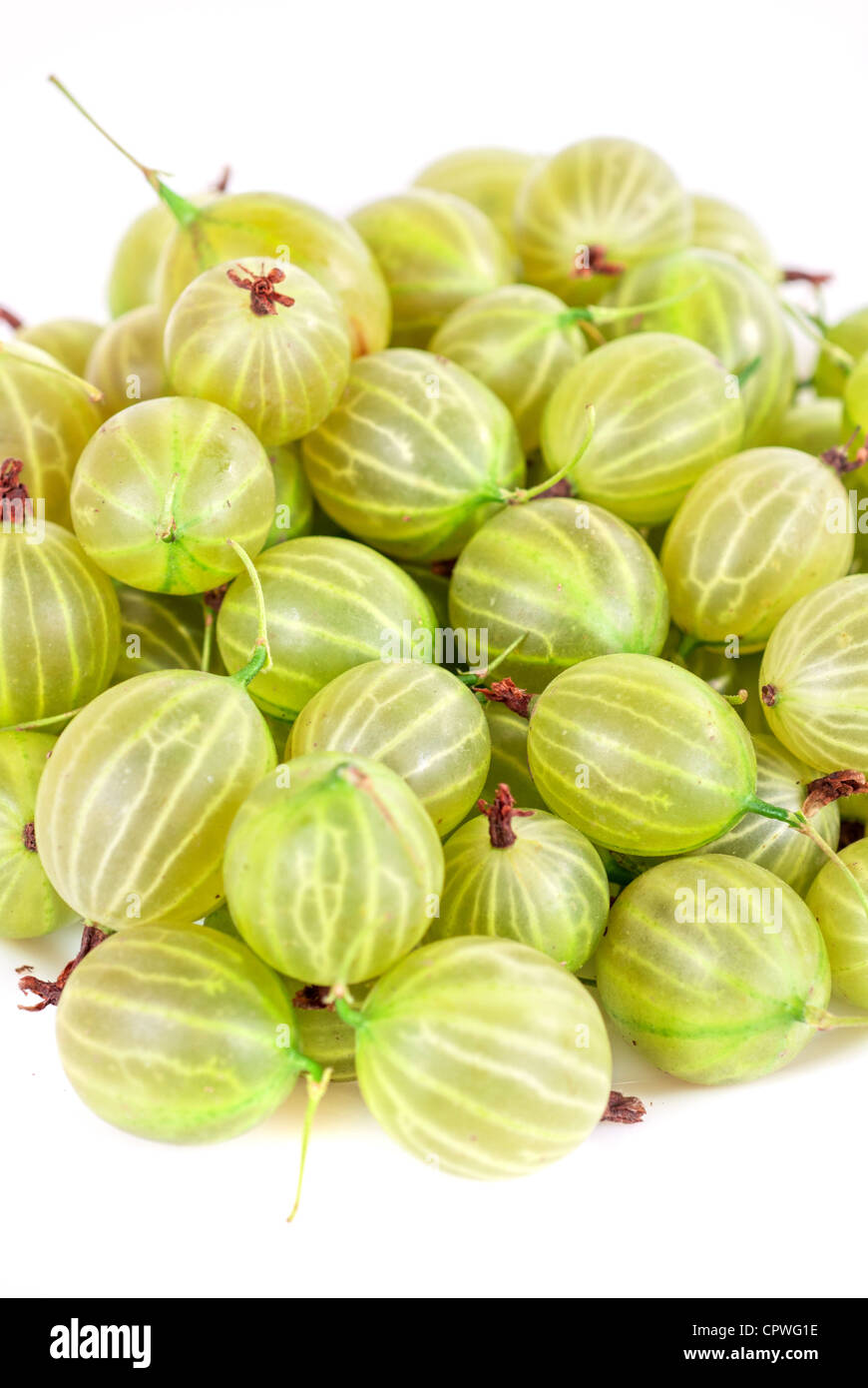 green ripe gooseberries isolated on a white background Stock Photo - Alamy