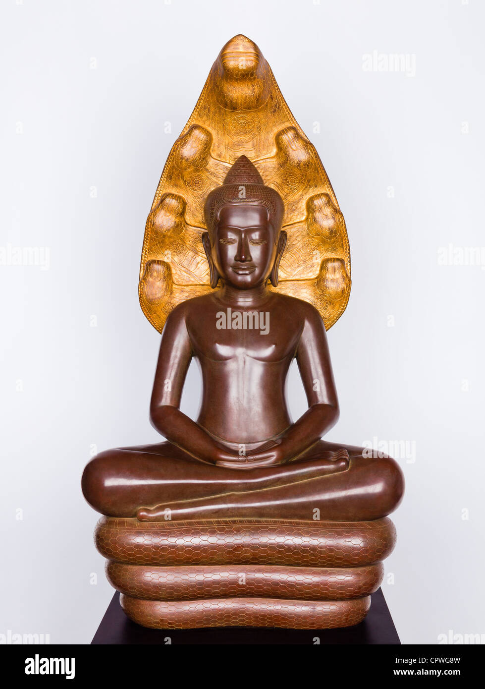 Khmer Naga Buddha lacquer statue against white background - Siem Reap ...