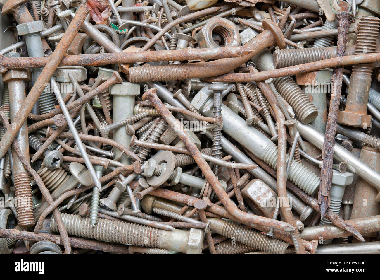 Rusty nails and screws texture background Stock Photo - Alamy
