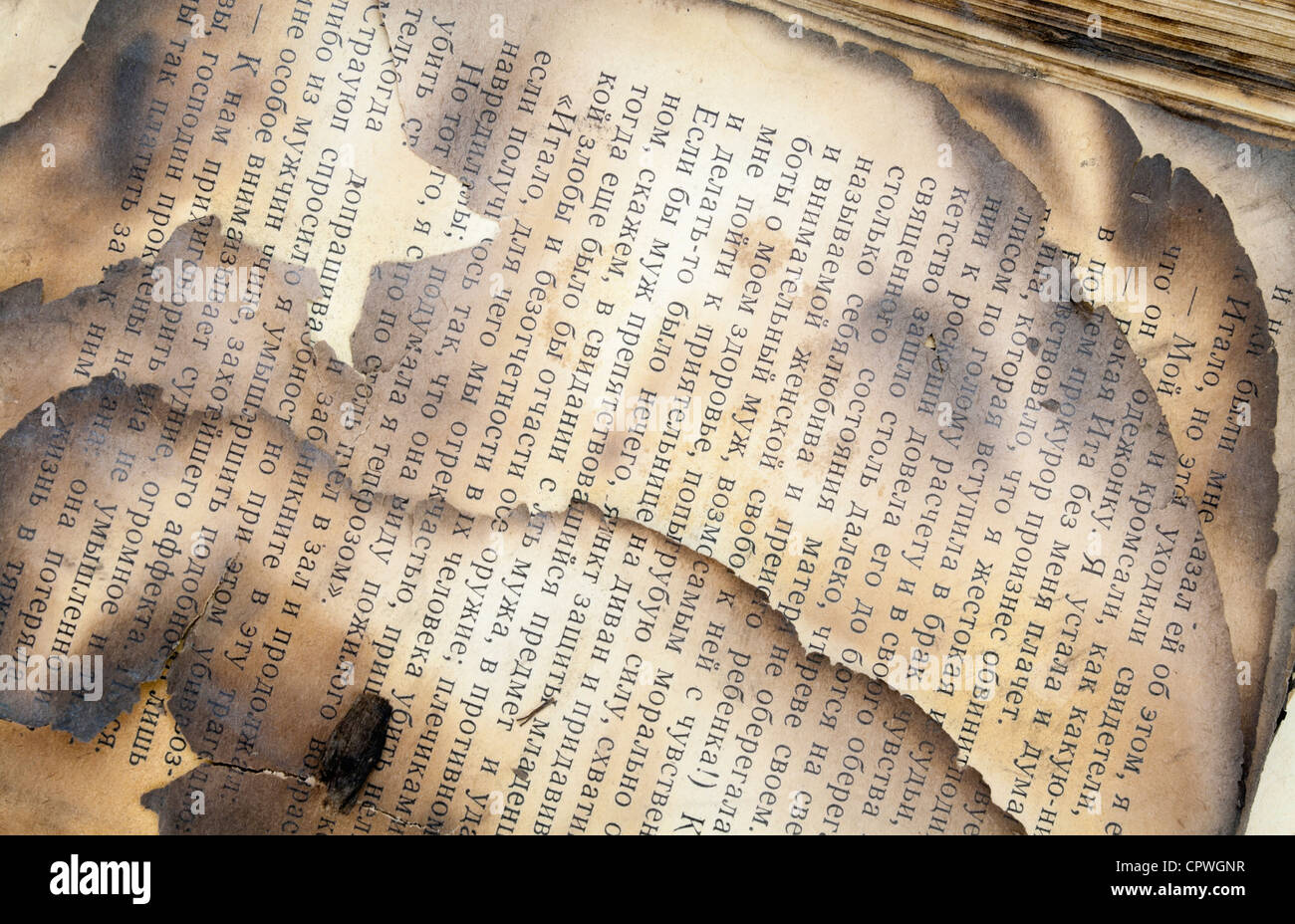 Burned Russian mass production old retro book background Stock Photo ...
