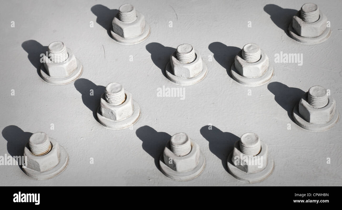 industrial background with painted bolts of steel structure Stock Photo ...