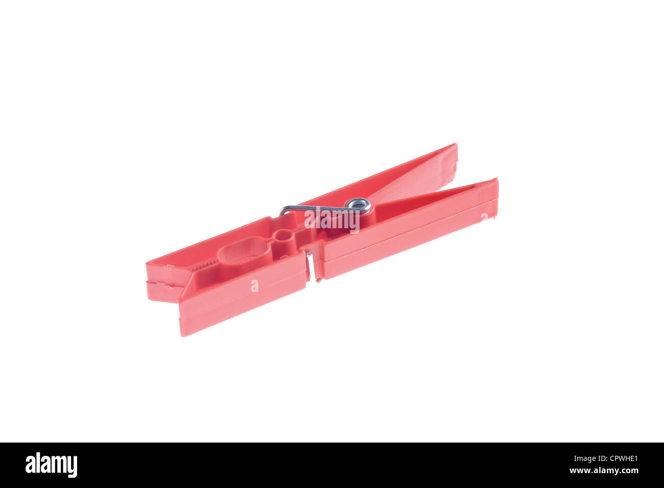 Clamps for hanging clothes. On white Stock Photo - Alamy