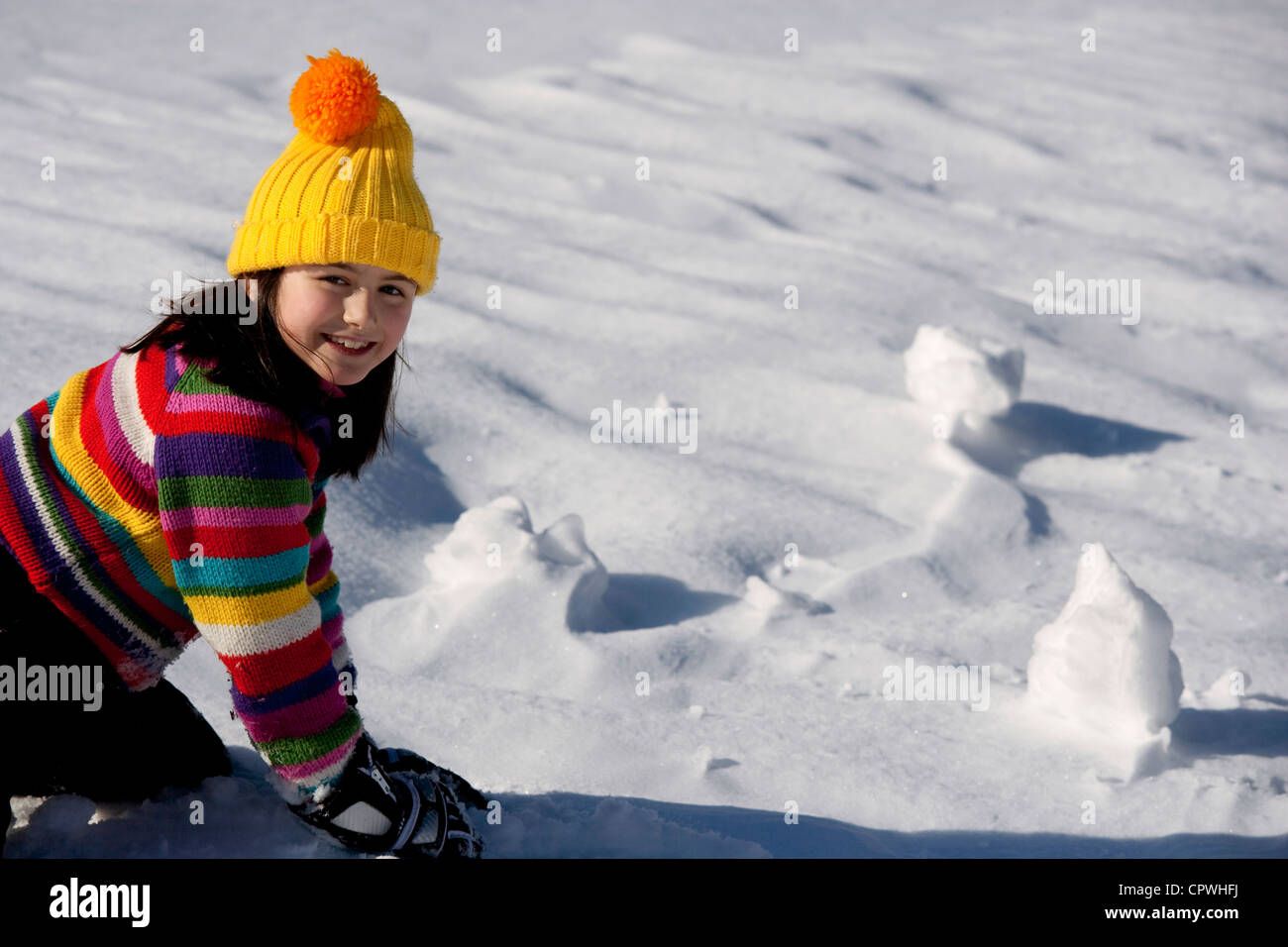 little girl with snowball Stock Photo - Alamy