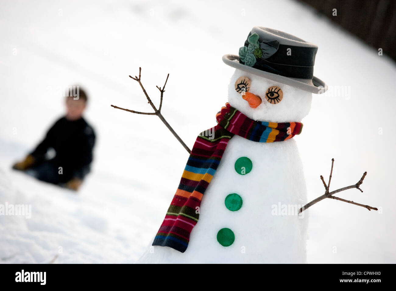 Snowman With Sticks For Arms High Resolution Stock Photography and ...