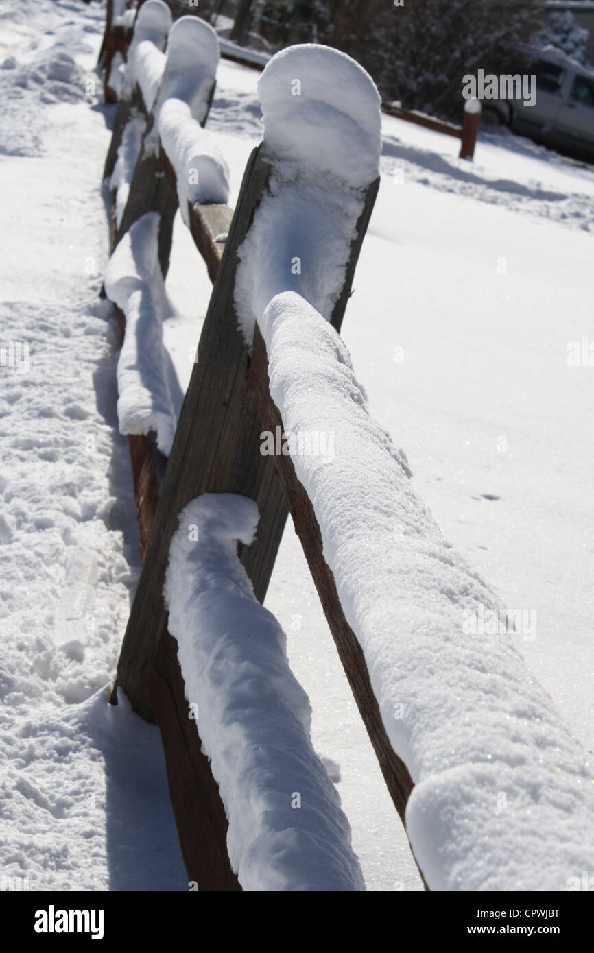 Rail fence covered with snow Stock Photo - Alamy