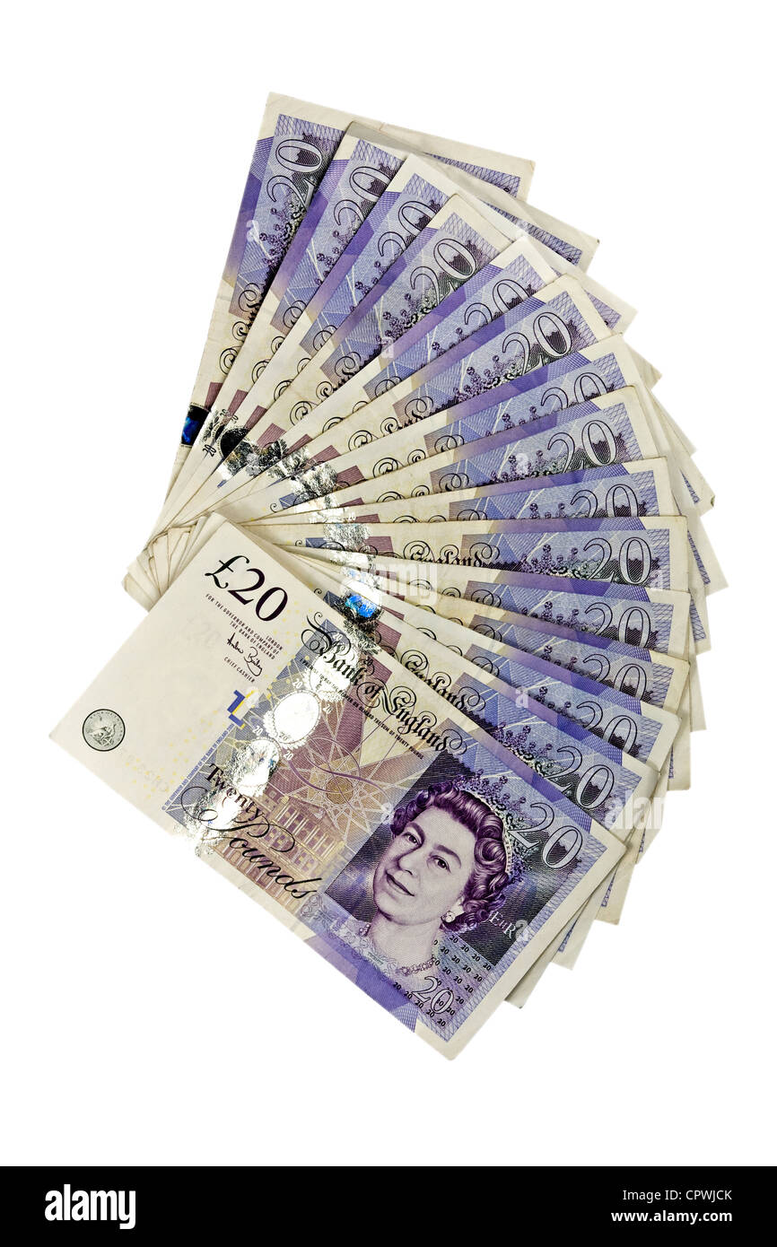banknotes of twenty pounds on white background Stock Photo - Alamy
