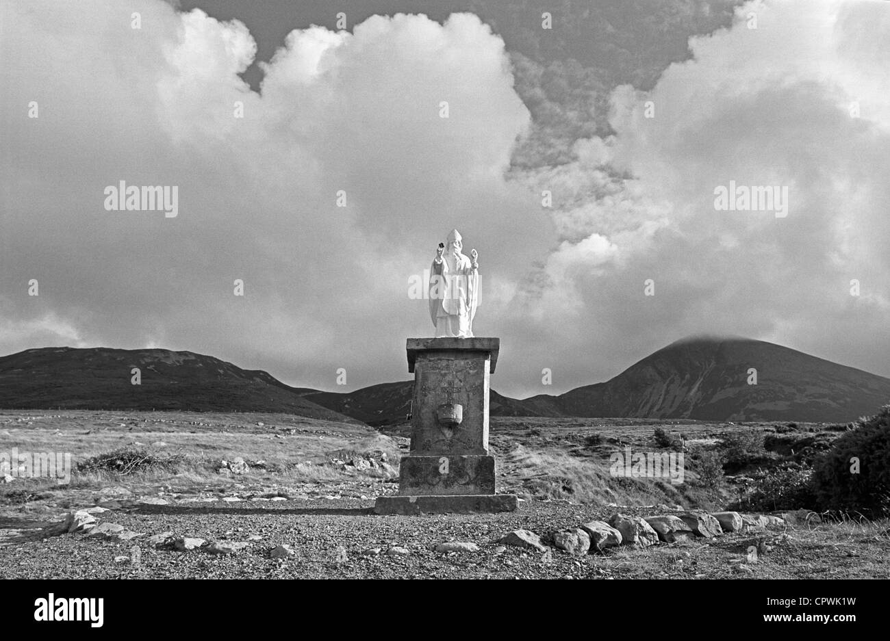 Statue of Saint Patrick with the mountain of Croagh Patrick in the ...