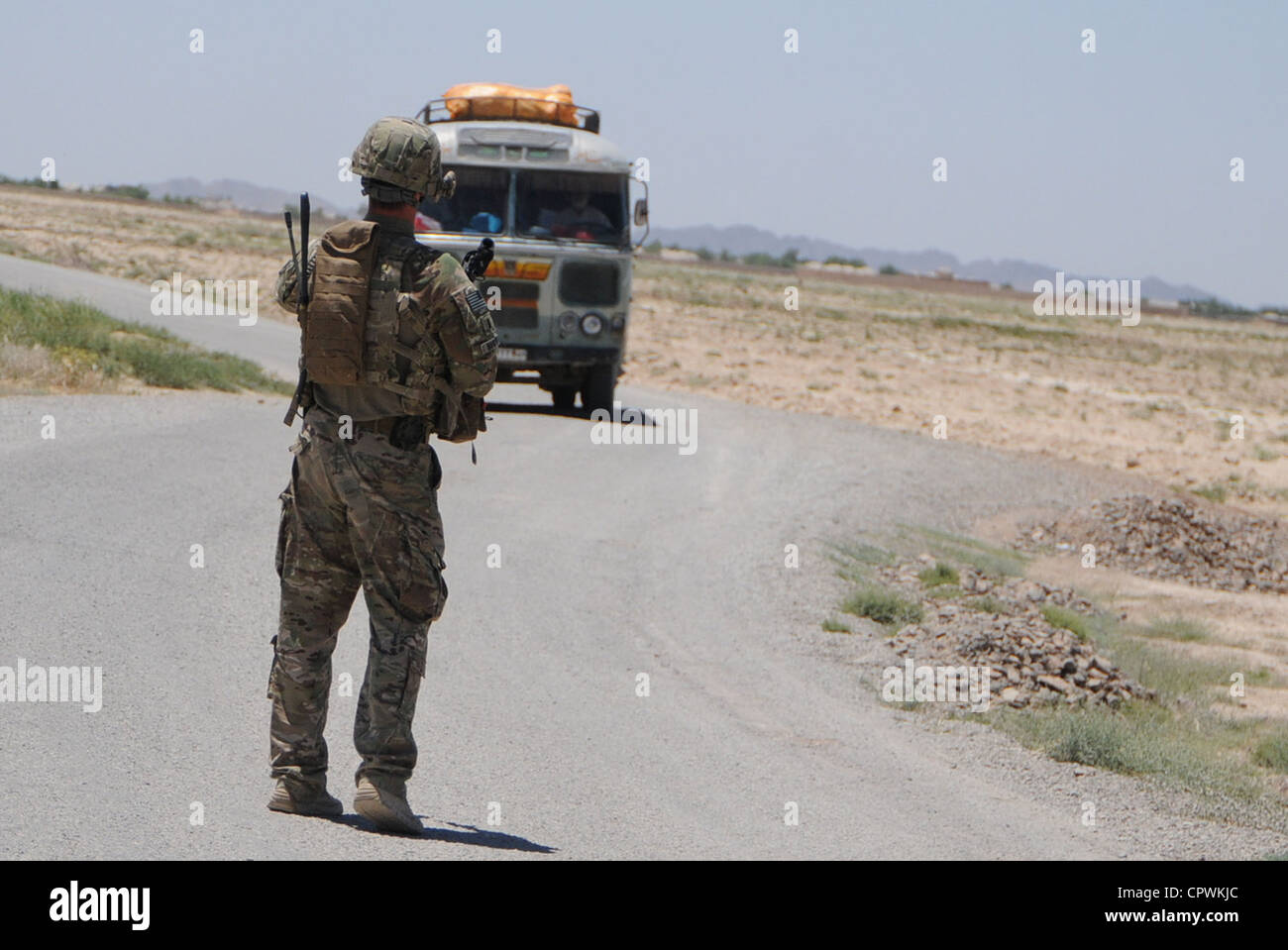 Provides security during a visit to cin farsi village hi-res stock ...
