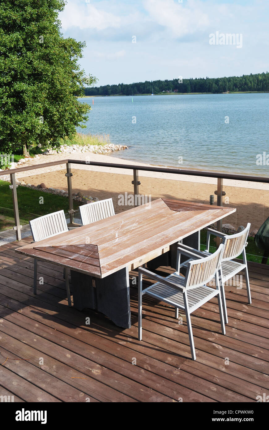 table and chairs on the terrace in summer Stock Photo - Alamy