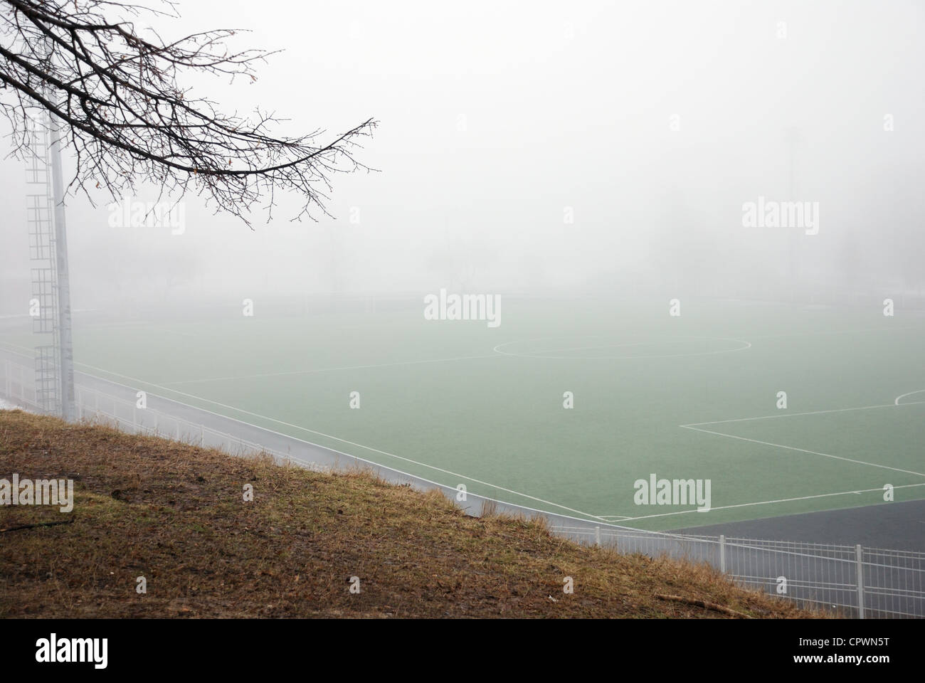 football field in thick fog in the morning Stock Photo - Alamy