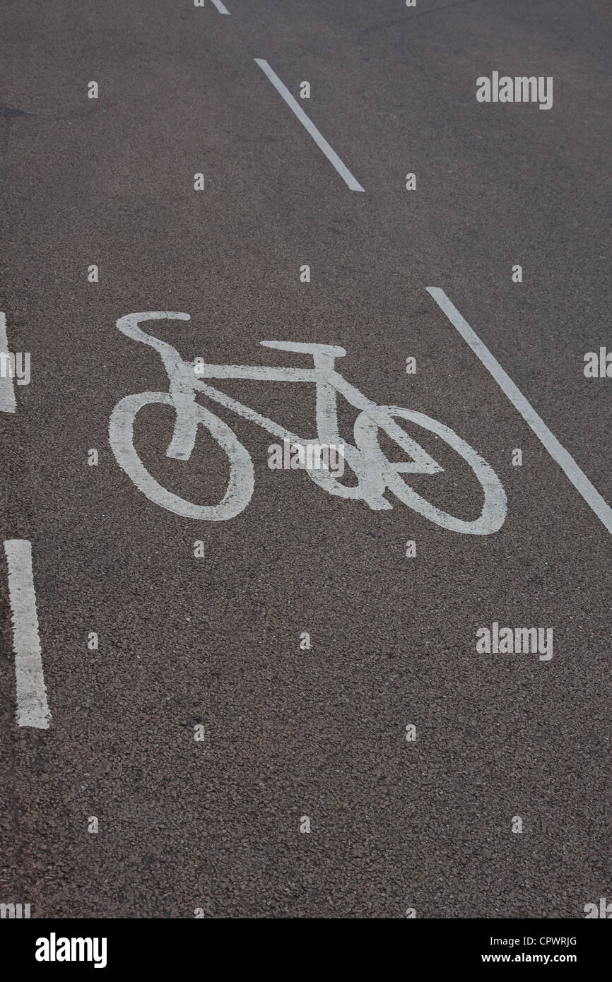 Sign painted on roadway for cycle lane Stock Photo - Alamy