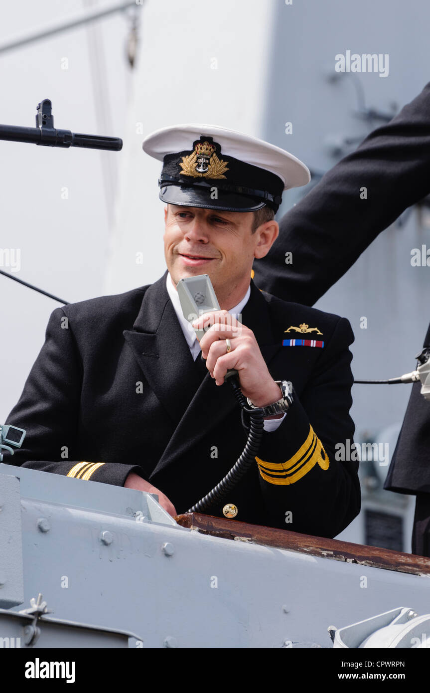 Royal Navy Officer conning a ship into dock Stock Photo - Alamy